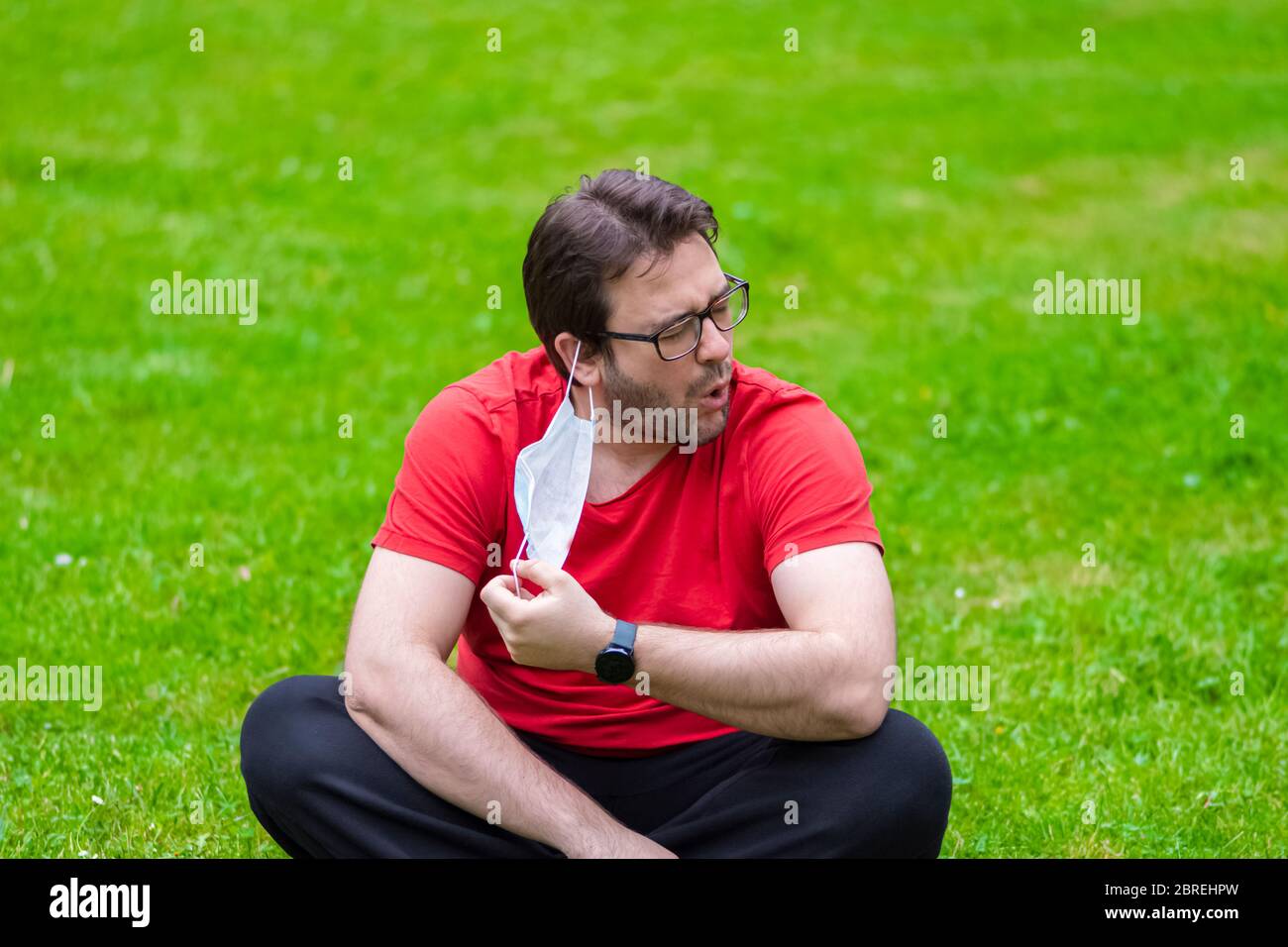 Fat man sitting park hi-res stock photography and images - Alamy