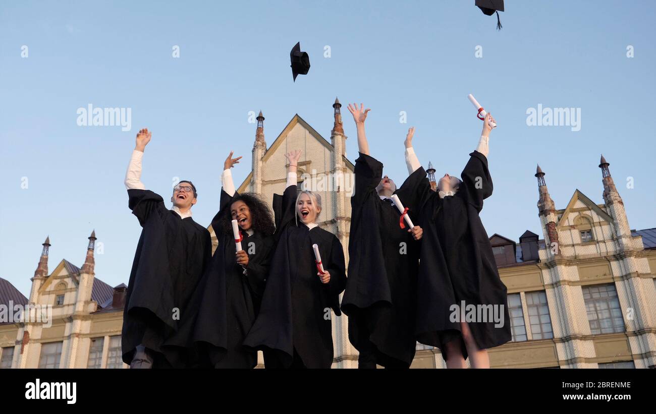 Graduation caps tossed air hi-res stock photography and images - Alamy