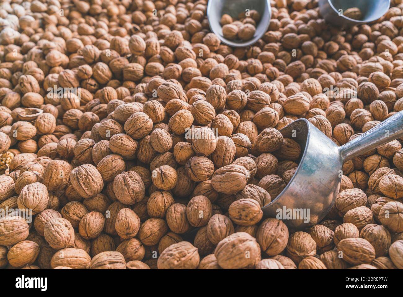 Pile of walnuts.in farmer shop,Agriculture background Stock Photo - Alamy