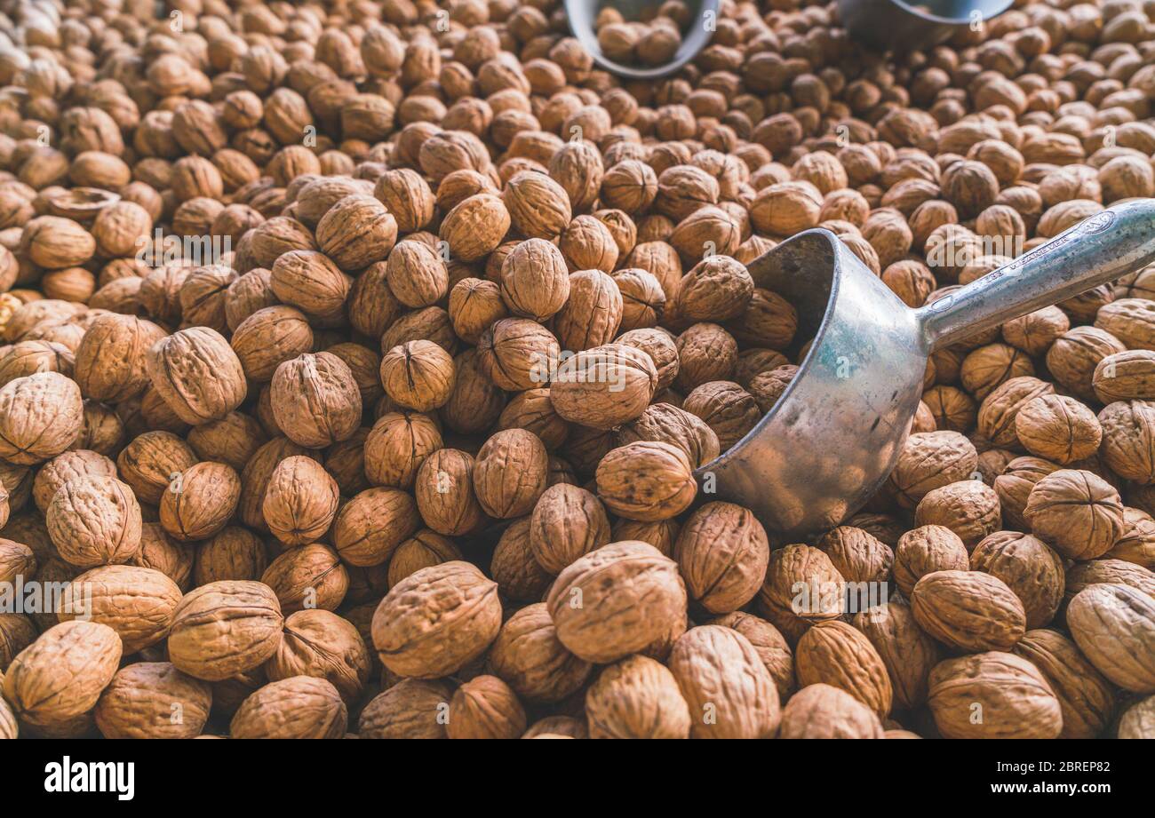 Pile of walnuts.in farmer shop,Agriculture background Stock Photo - Alamy