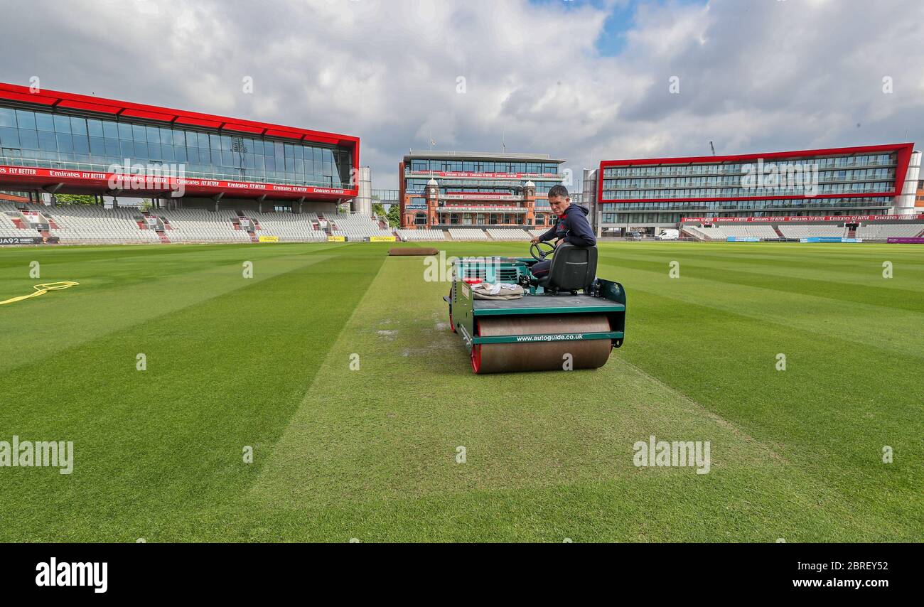 Head Groundsman Matt Merchant works on the pitch at Emirates Old ...