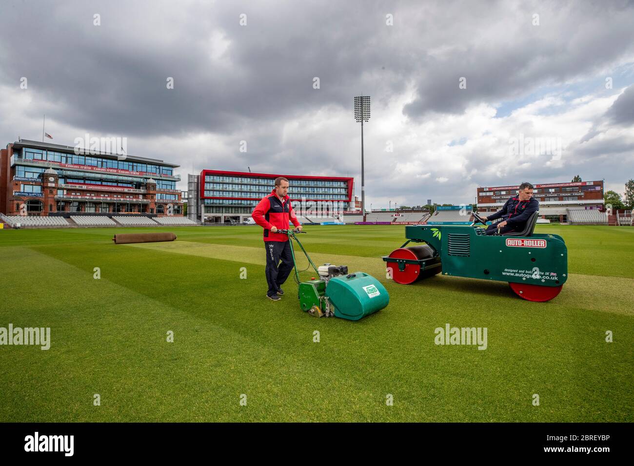 Head Groundsman Matt Merchant and David Shortt work on the pitch at ...