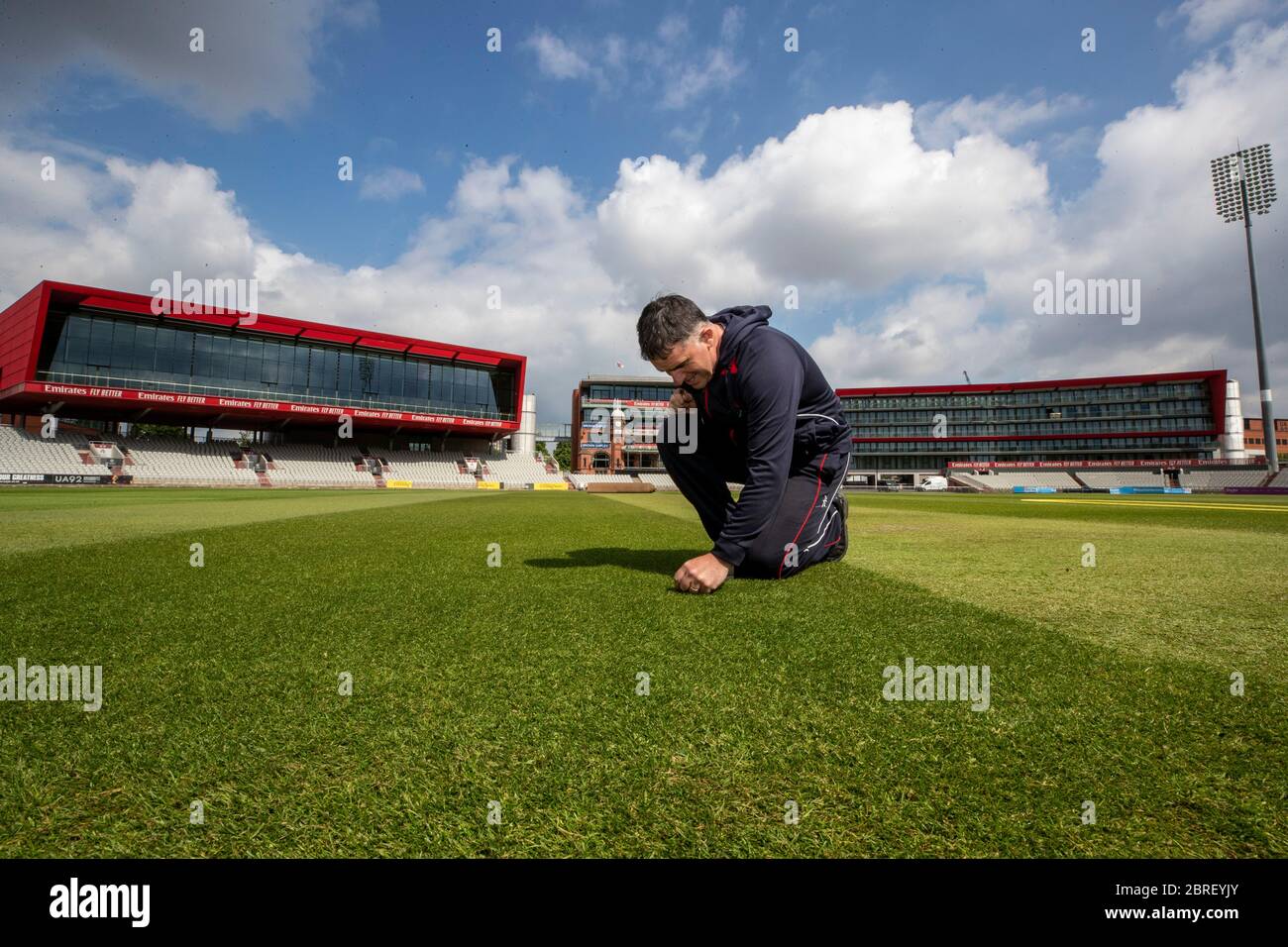 Head Groundsman Matt Merchant works on the pitch at Emirates Old ...