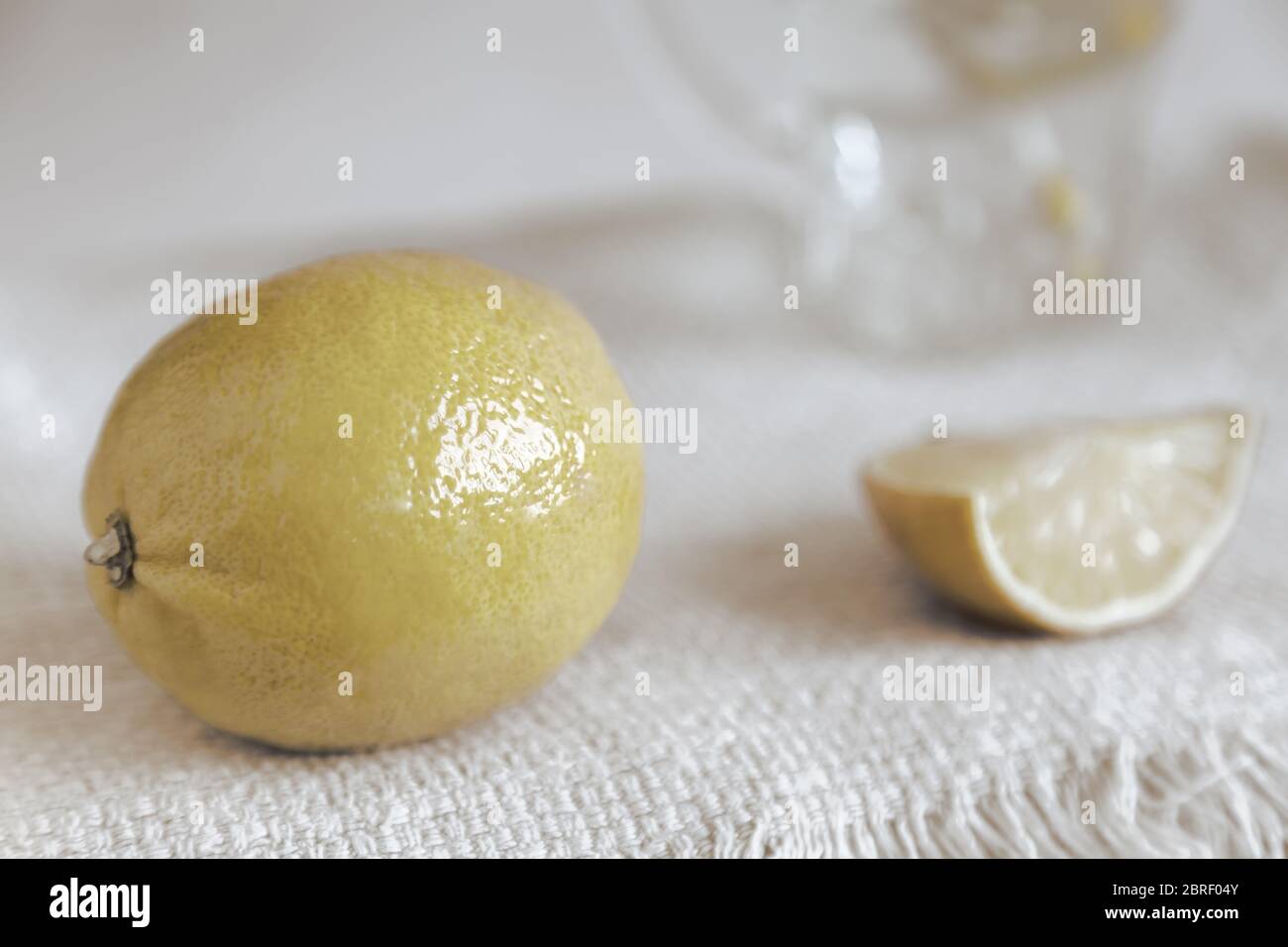 The lemon and cut a slice of lemon Stock Photo - Alamy