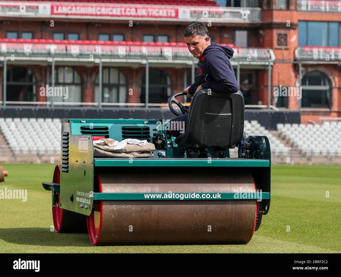 Head Groundsman Matt Merchant works on the pitch at Emirates Old ...