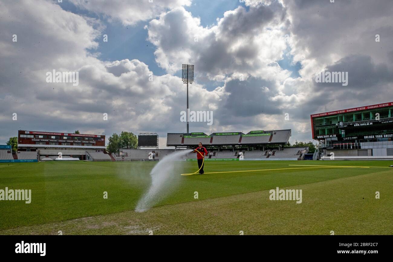 Groundsman David Shortt works on the pitch at Emirates Old Trafford ...