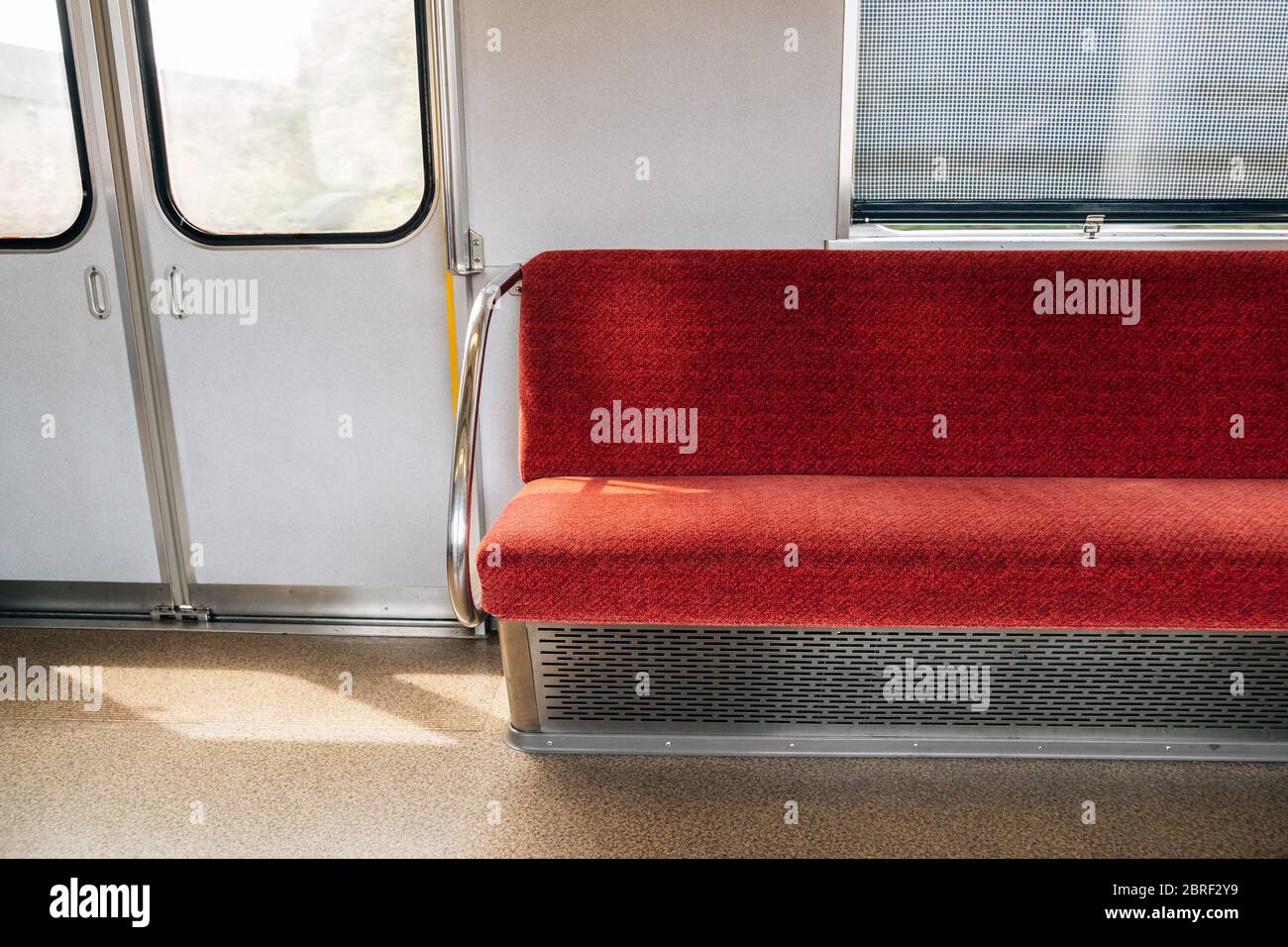 Interior of subway. Inside Japanese metro train. Empty seats and door ...