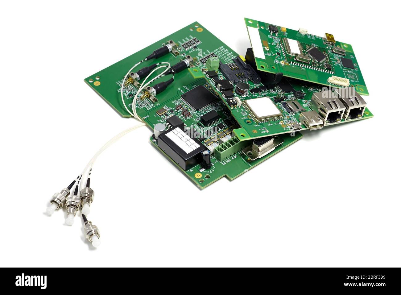 Set of electronic printed circuit boards with optic connectors attached ...