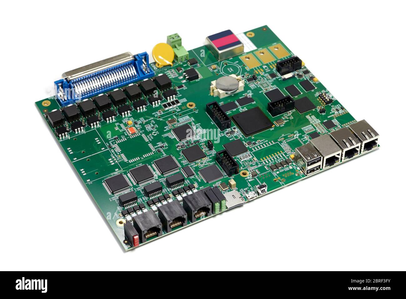 Electronic printed circuit board with chips and other components, green ...