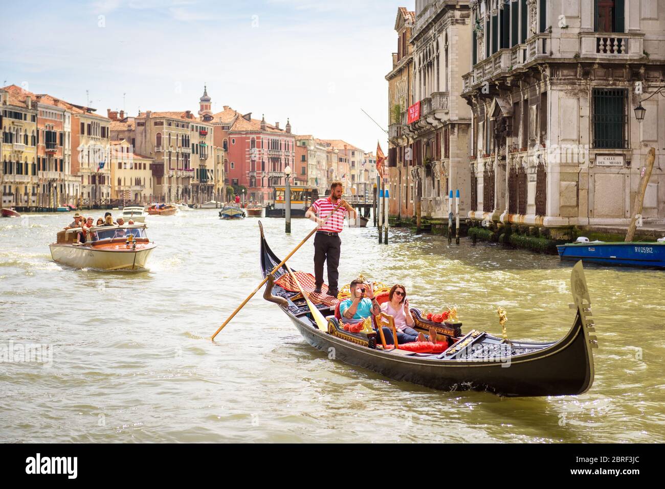 Venice, Italy - May 19, 2017: Gondola with people sails on Grand Canal ...