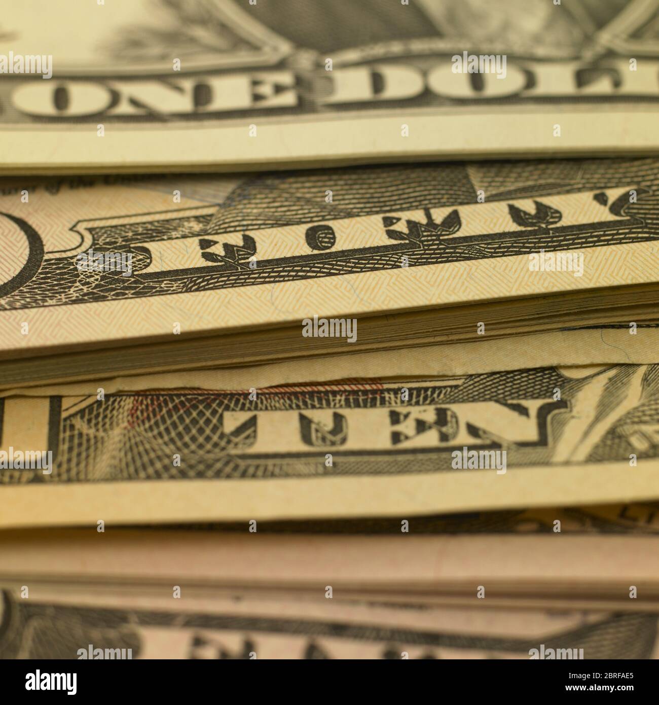 Large stack of mixed US dollar banknotes closeup Stock Photo - Alamy