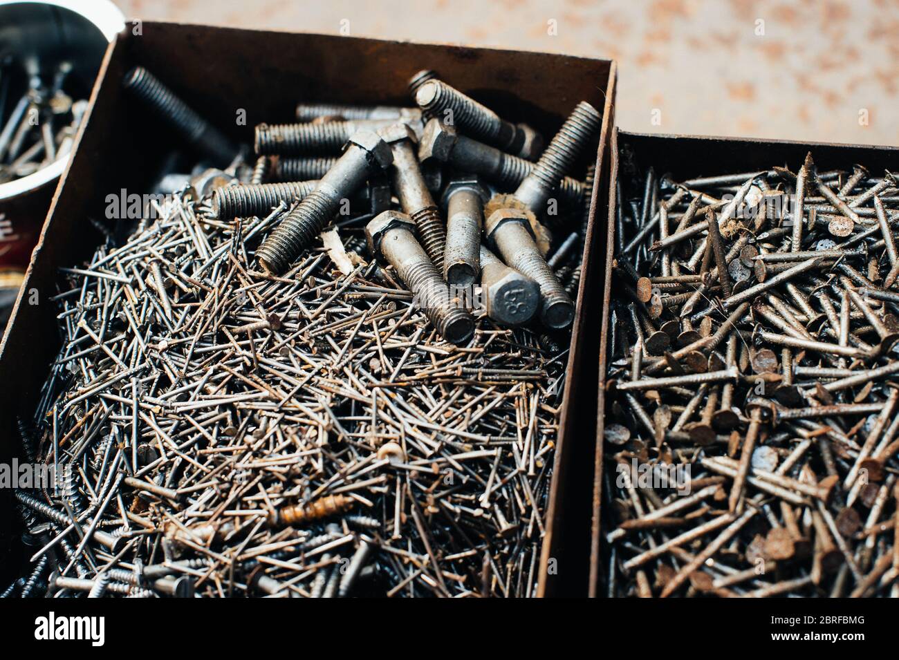 Scrap metal. Box with old rusty nails. Close-up. Macro Stock Photo - Alamy
