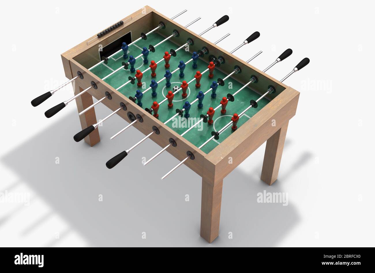A full view of a wooden foosball table with teams in red and blue on an ...