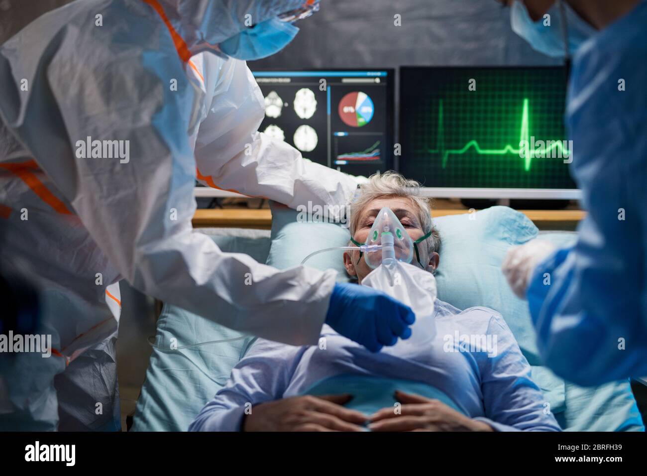 Infected patient in quarantine lying in bed in hospital, coronavirus ...