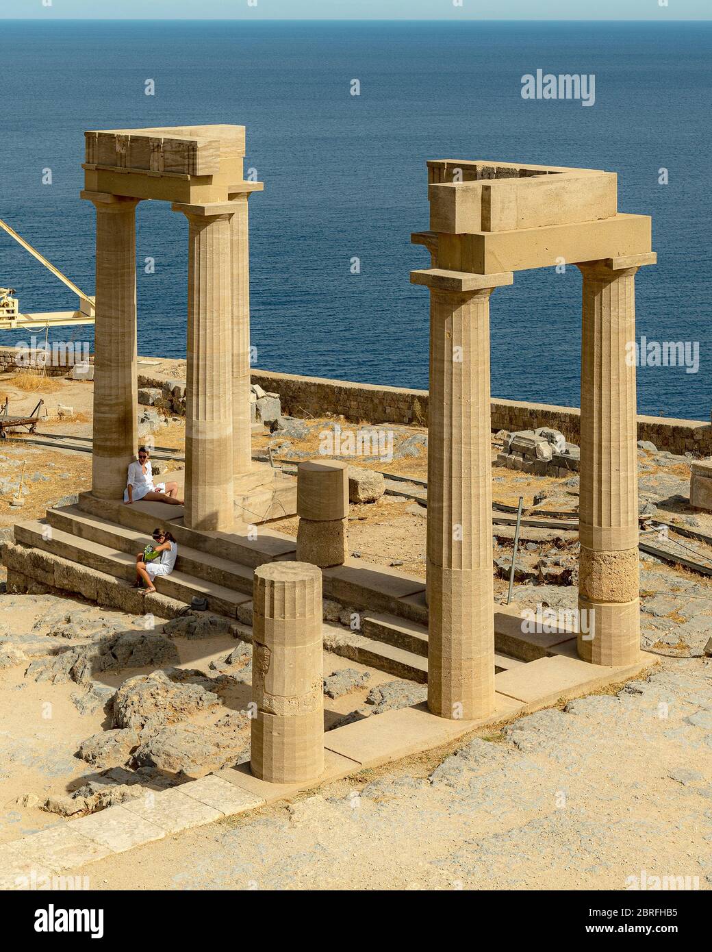 LINDOS, GREECE - OCTOBER 04, 2018: The ruined temple of Athena at the ...