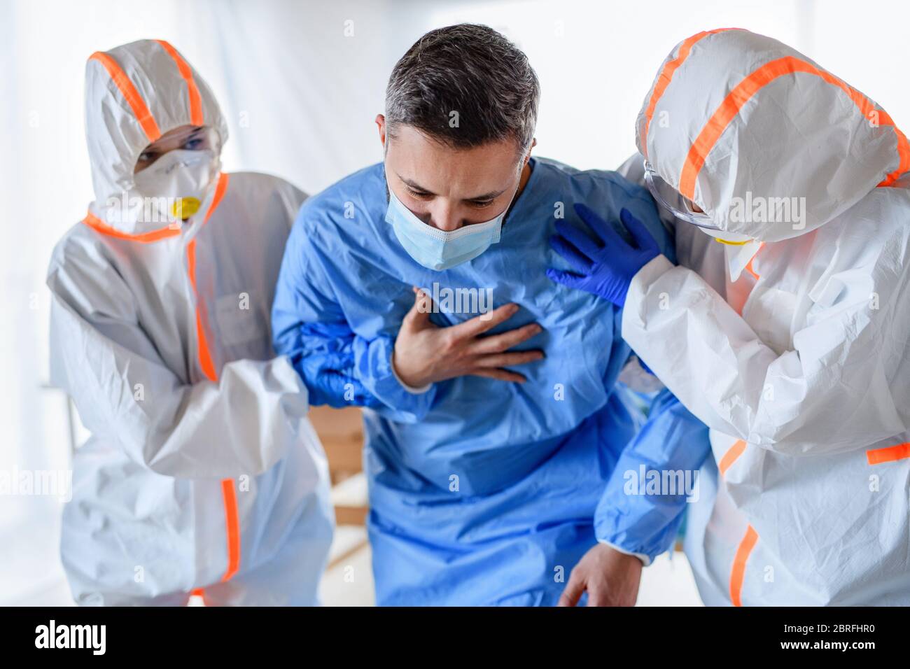 Doctors with infected patient in quarantine in hospital, coronavirus ...