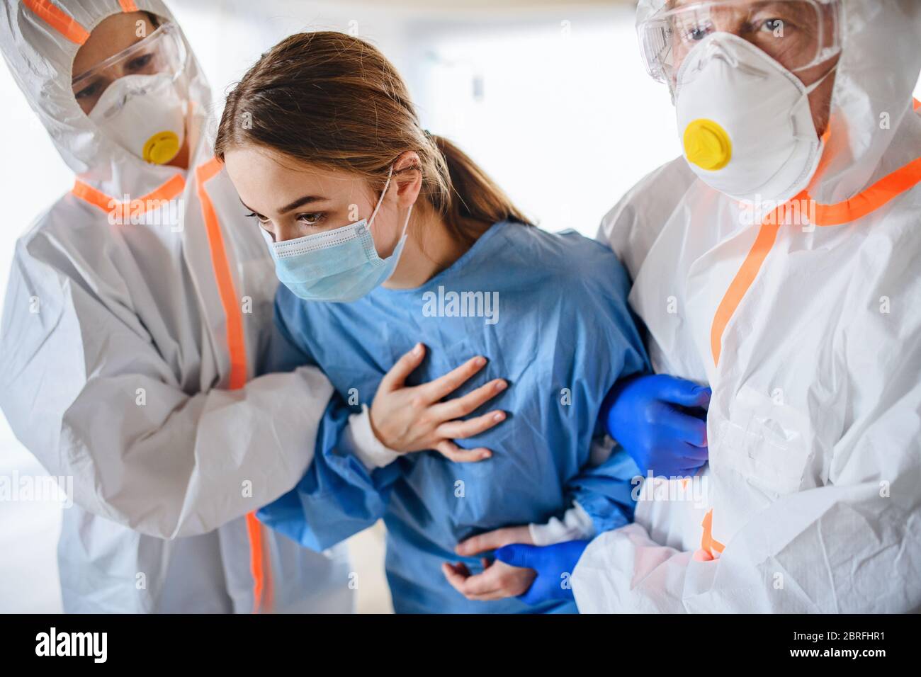 Doctors and infected patient in quarantine in hospital, coronavirus ...