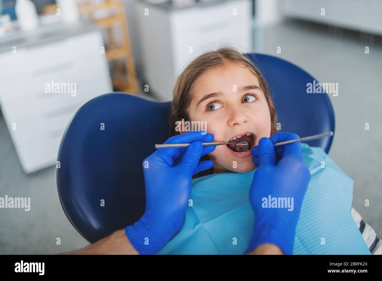 Annual dental check-up of a child in dentist surgery Stock Photo - Alamy