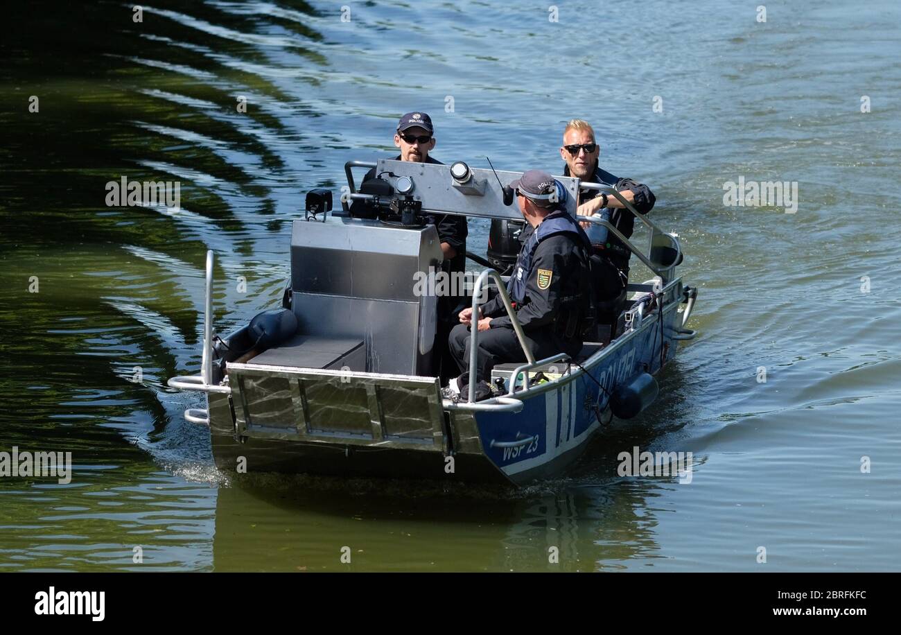 Leipzig, Germany. 21st May, 2020. Water police officers patrol the ...