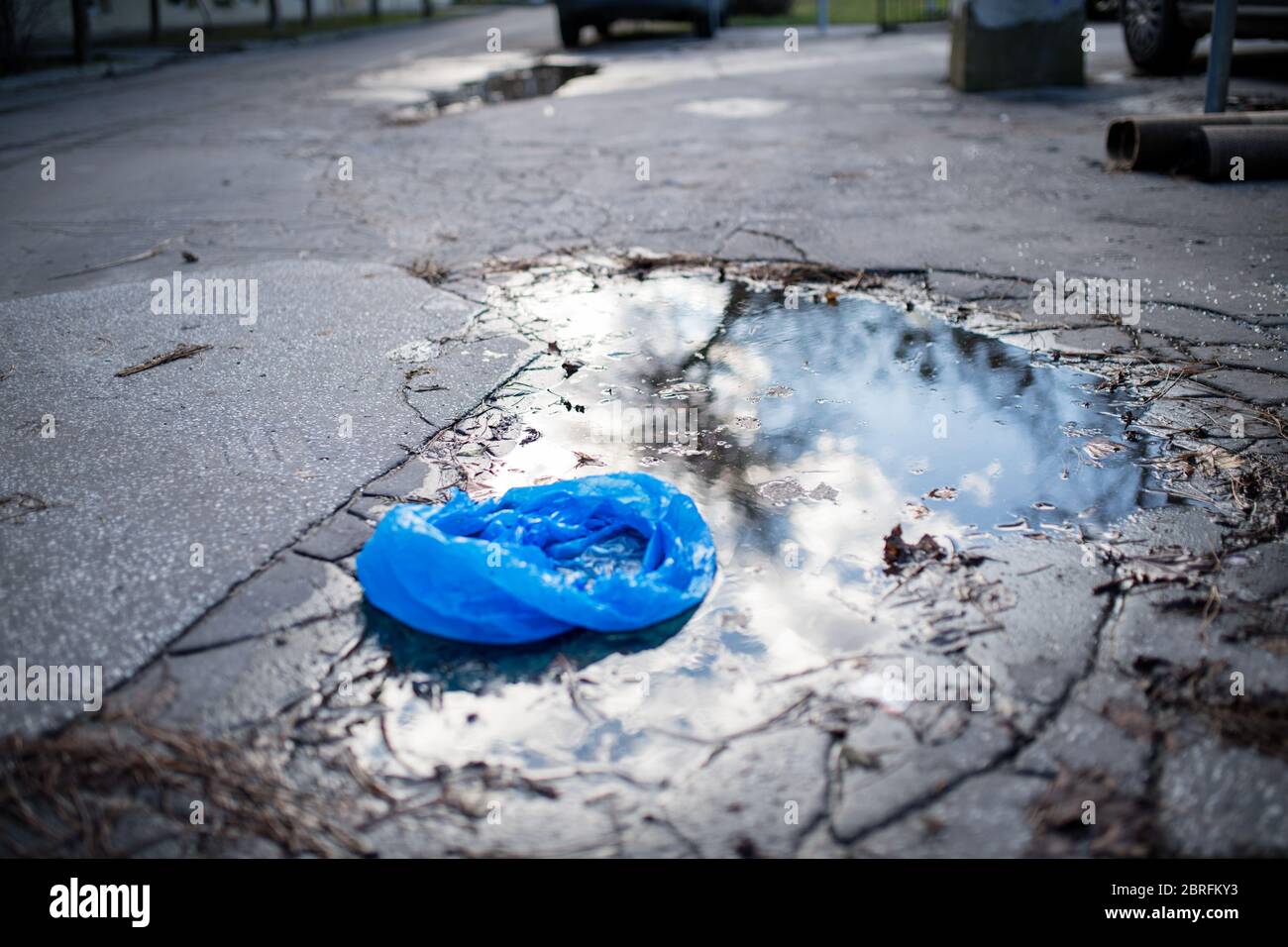 Plastic trash on the urban street. Copy space Stock Photo - Alamy