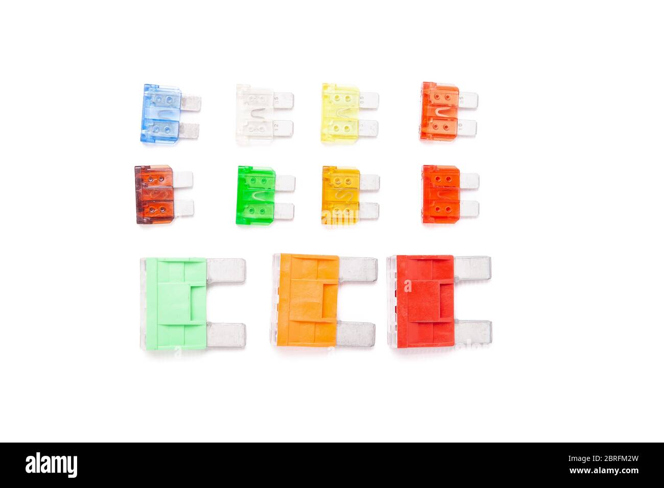 Colorful set of electronic fuses in yellow green orange red and blue on ...