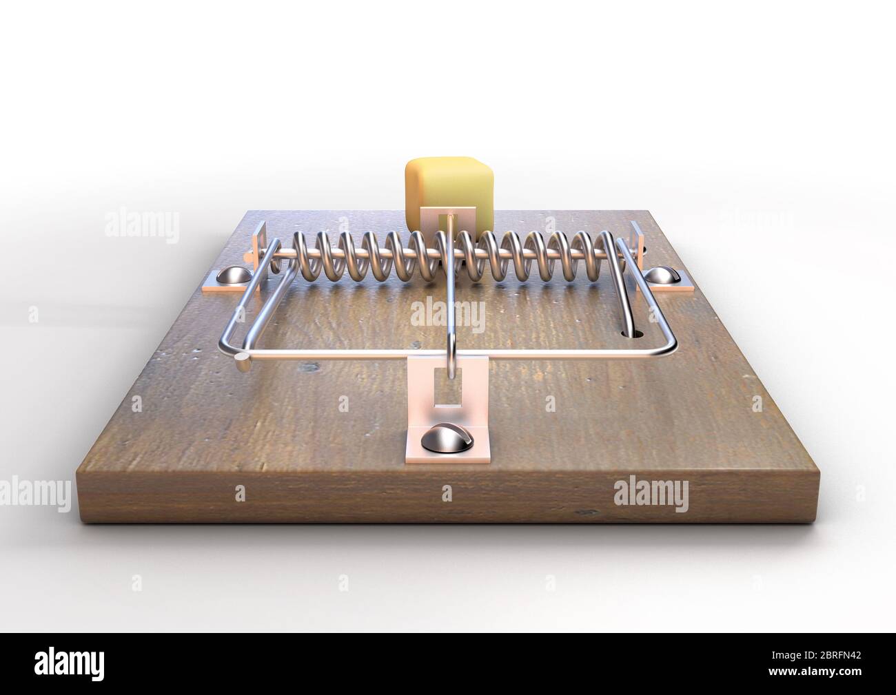 A regular wood and metal mousetrap baited with a block of cheese on a ...