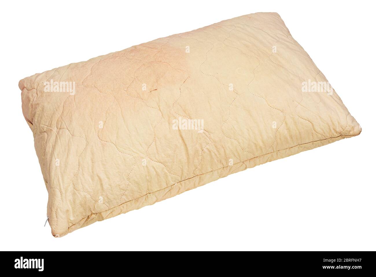 dirty used spotted pillow isolated on white background in diagonal ...