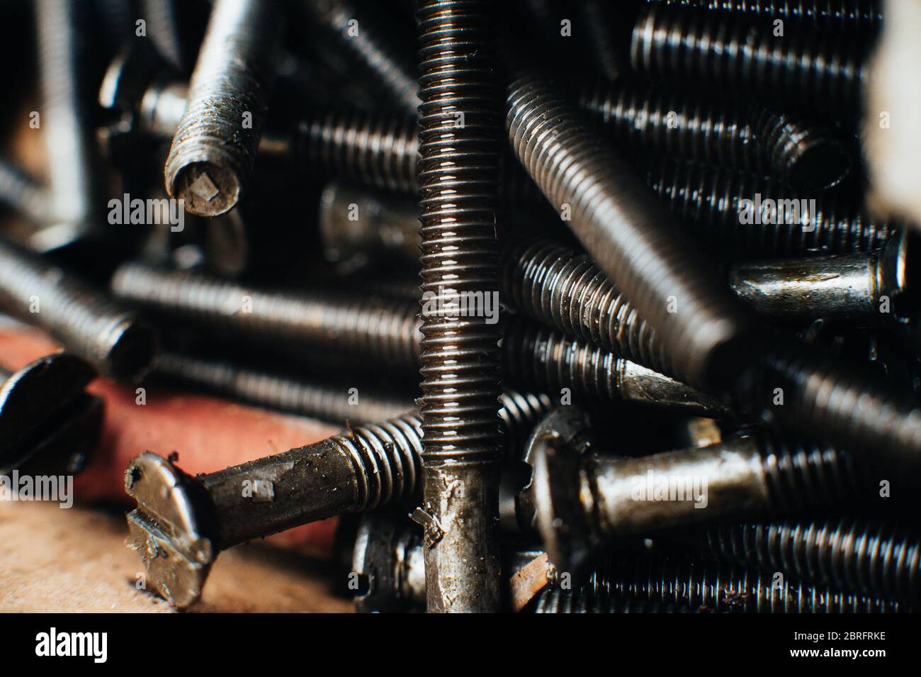 Scrap metal. Old oil bolt. Close-up. Macro Stock Photo - Alamy