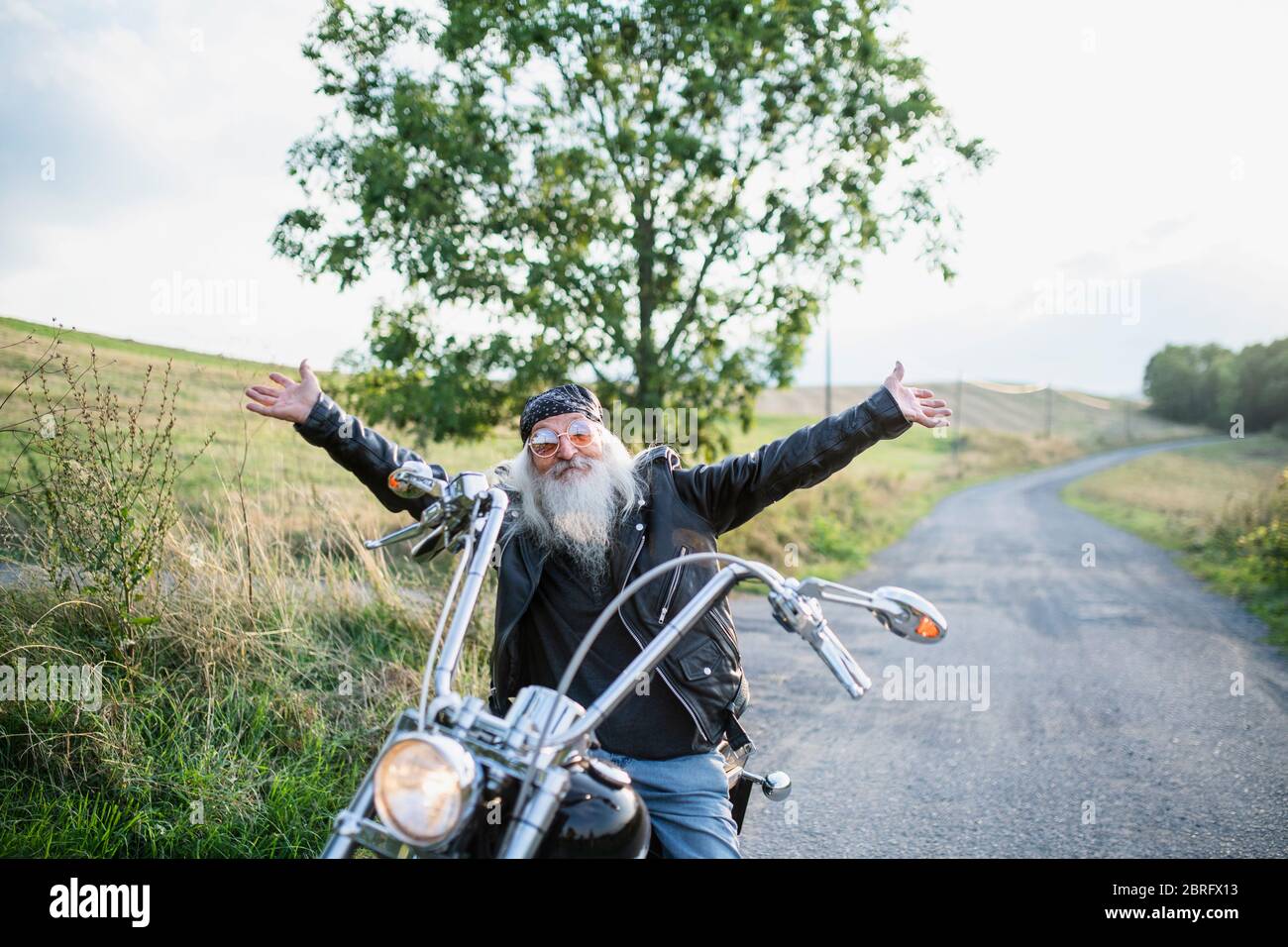 Elderly man stretching in hi-res stock photography and images - Alamy