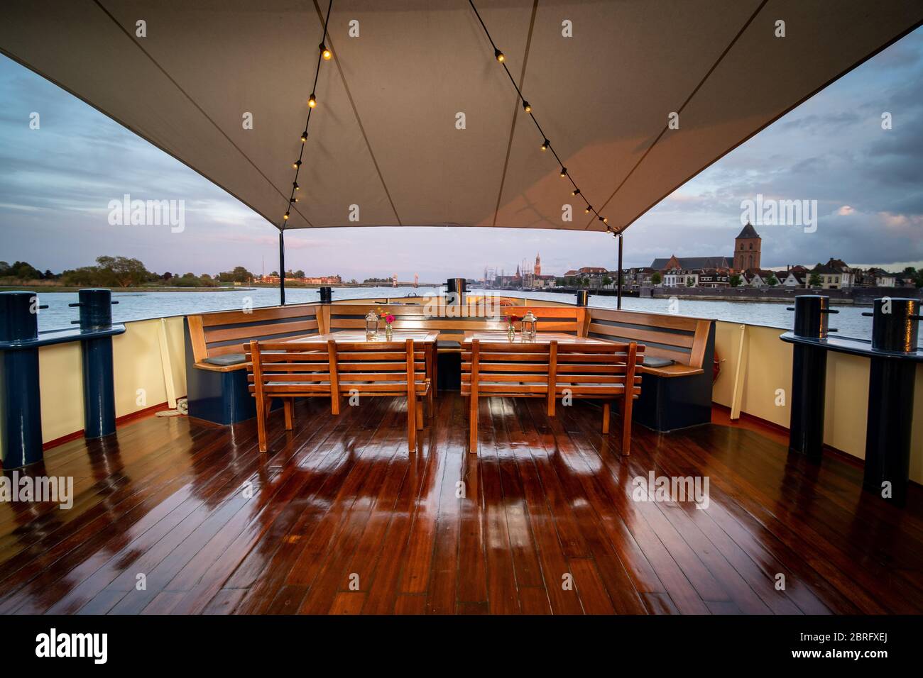 Atmospheric Sunset view during tourist cruise from the aft ship deck ...