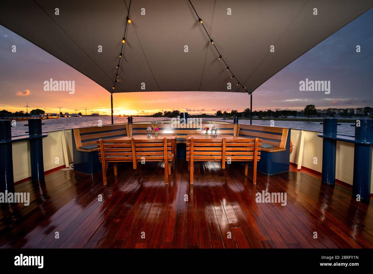 Atmospheric Sunset view during tourist cruise from the aft ship deck ...