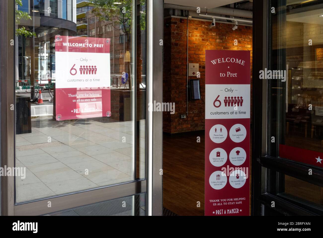 Shop notice for customers in Pret A Manger store, limiting number of ...