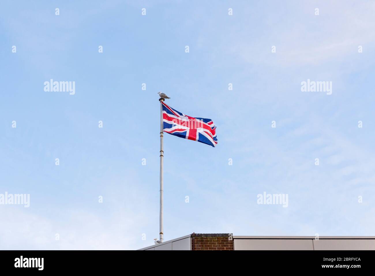 Flag of the United Kingdom, Flag of England embroidered on blue sky on ...