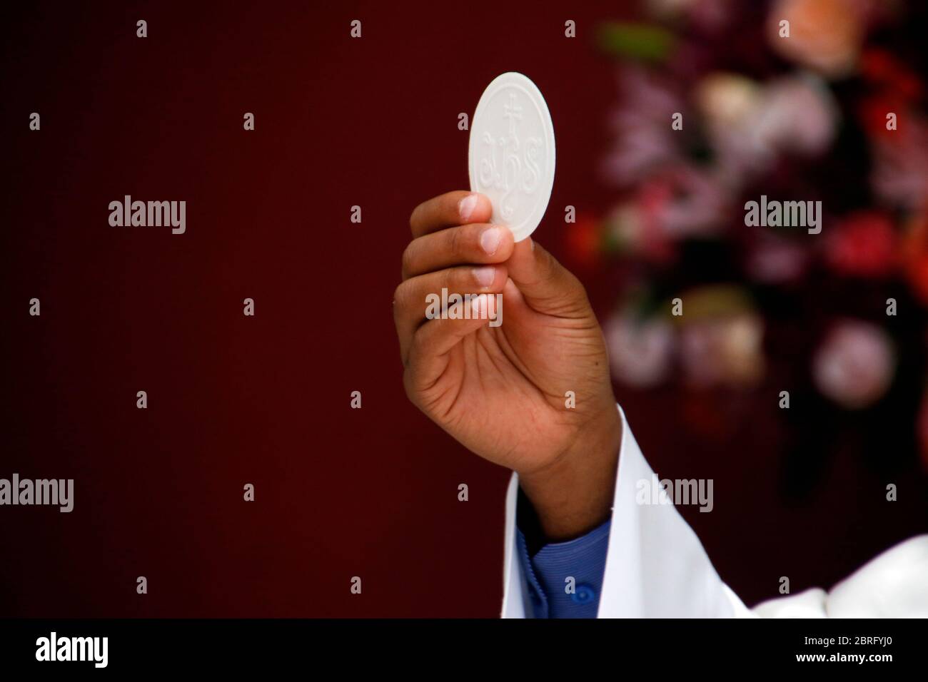 Holy Wafer. Holy communion in church. Taking holy Communion. Priest ...