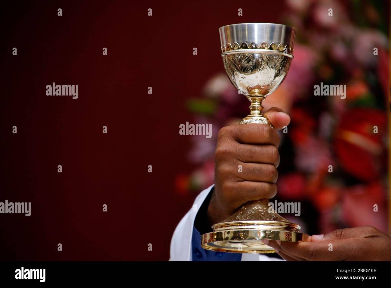 Holy Wafer. Holy communion in church. Taking holy Communion. Priest ...