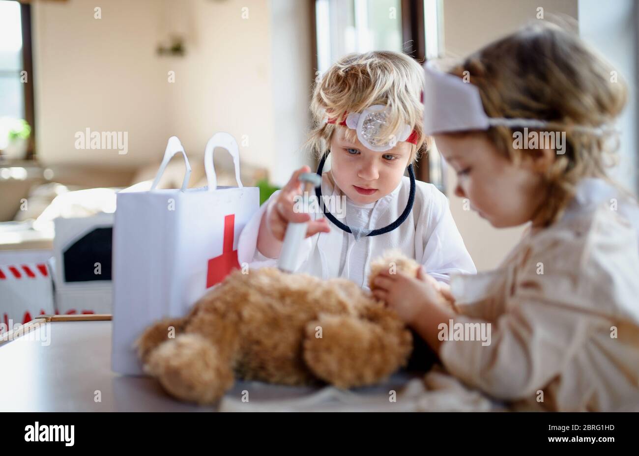 Brother sister playing doctor stethoscope hi-res stock photography and ...