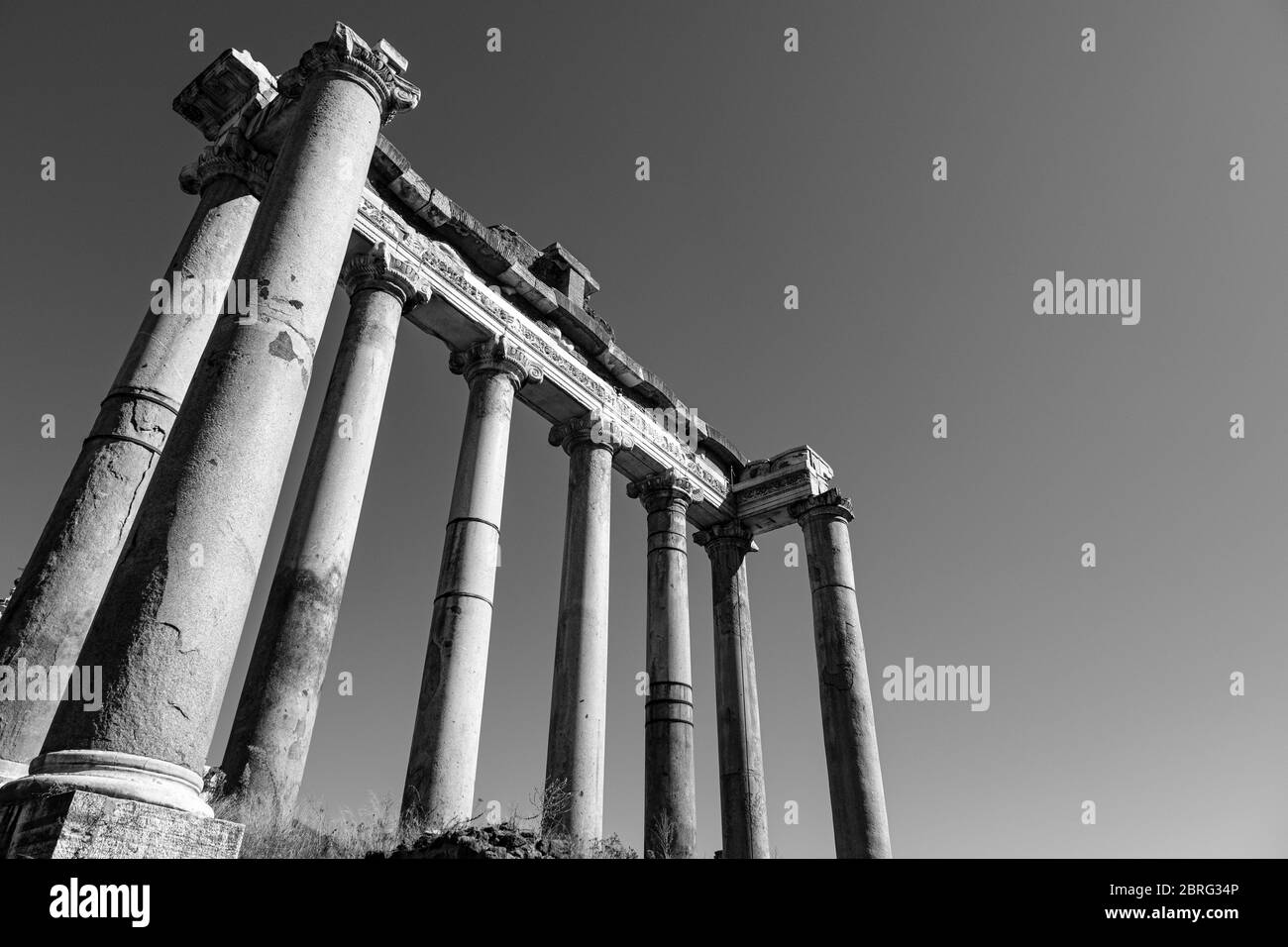 Black and White Columns of the Temple of Saturn in the ruins of the ...
