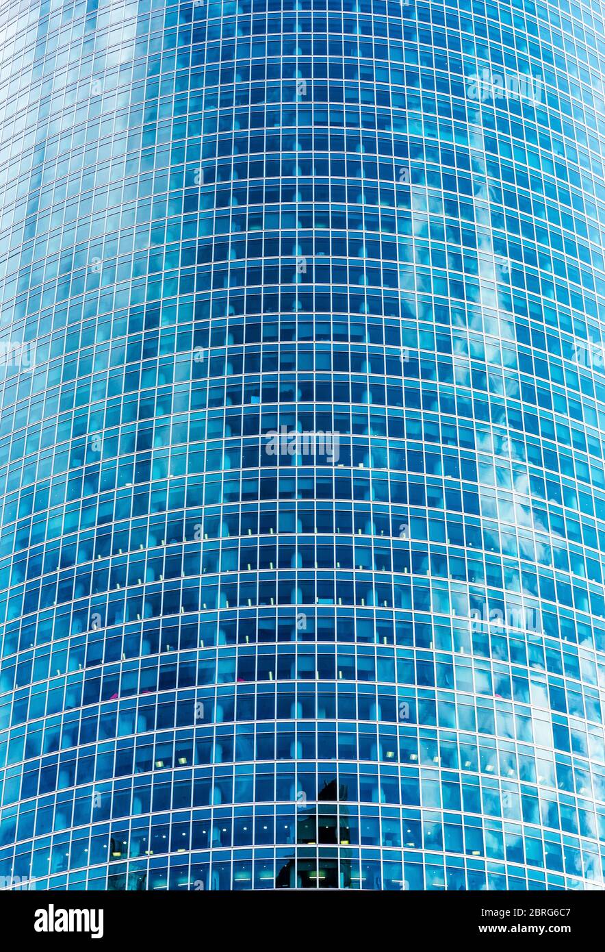 The sky is reflected in a modern skyscraper. Background and concept of ...