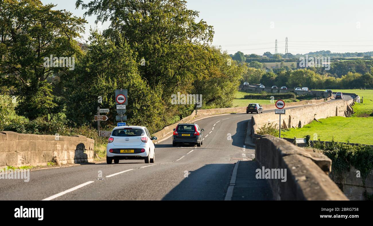 Traffic travelling along a road in rural Derbyshire, England Stock ...