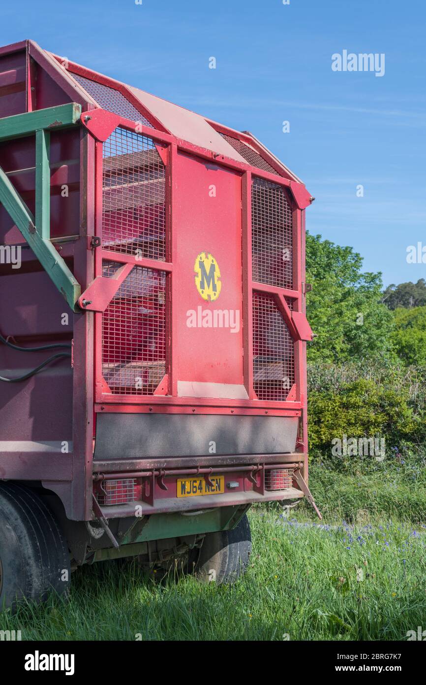UK Marshall silage trailer sitting empty beside rural hedgerow ...