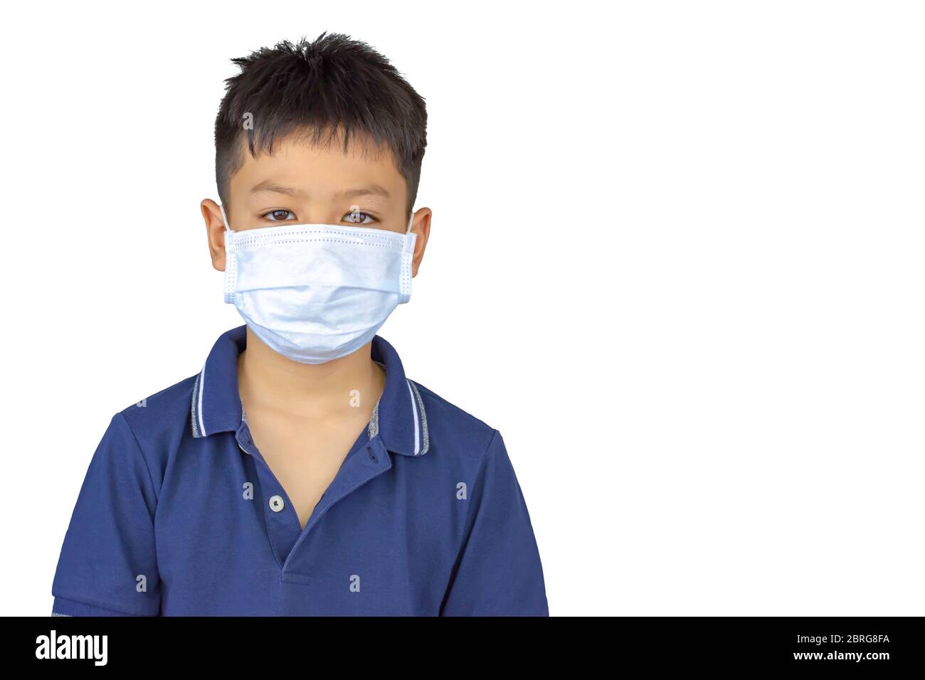 Isolated Asian boy wearing a mask on a white background with clipping ...