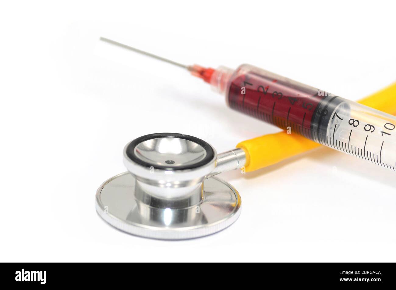 syringe with stethoscope Stock Photo - Alamy