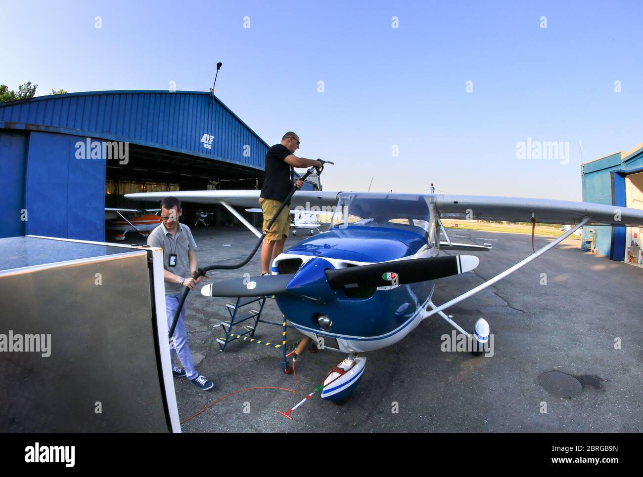 Cessna C172 aircraft stop on the hangar during the supply of kerosene ...