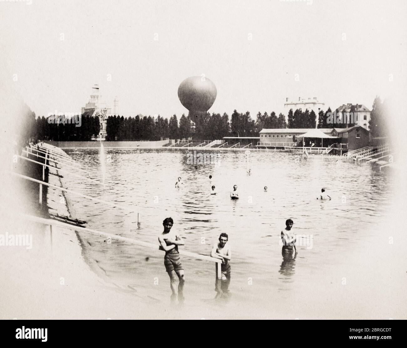 Vintage late 19th century photograph - bathers in a swimming basin pool ...