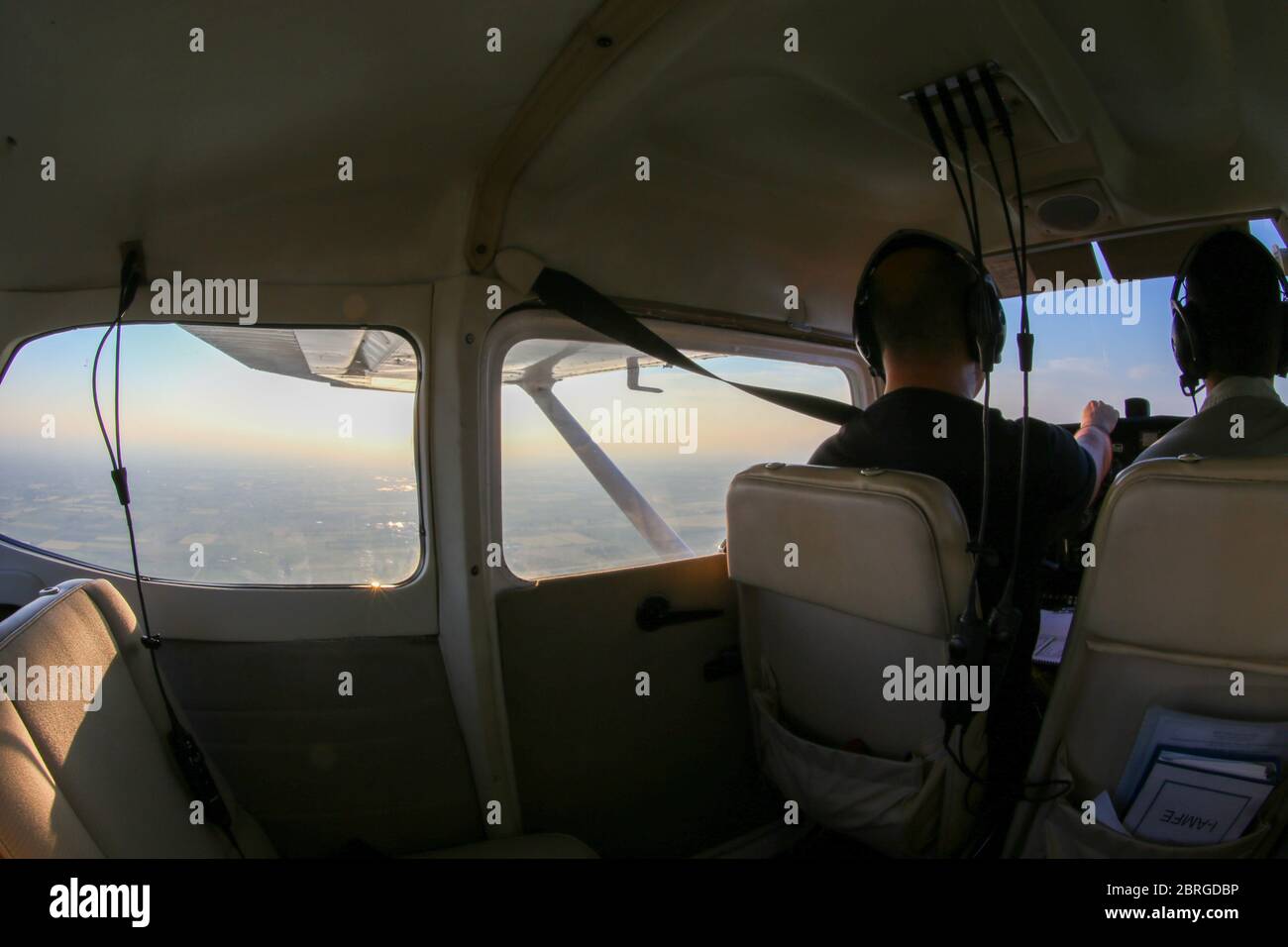 Cessna aircraft pilots in cockpit Stock Photo - Alamy