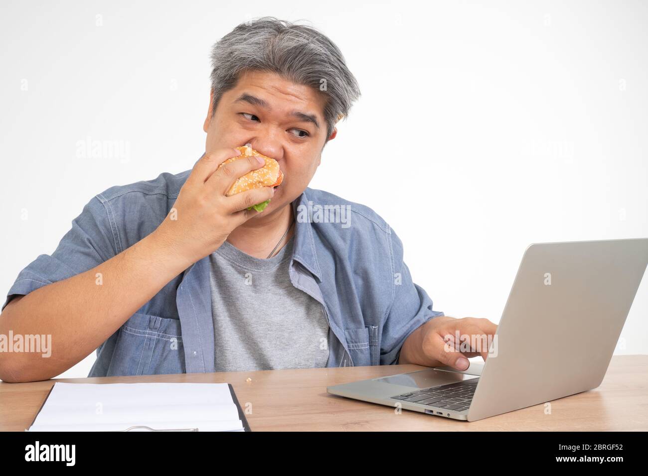 Fat business man desk hi-res stock photography and images - Alamy