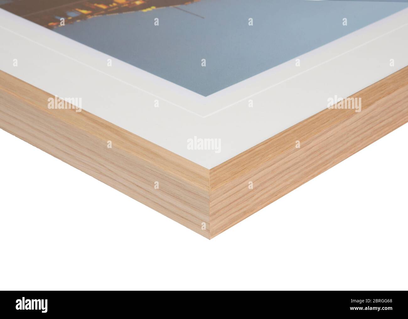 The corner and edge of a high quality wood photo frame complete with ...