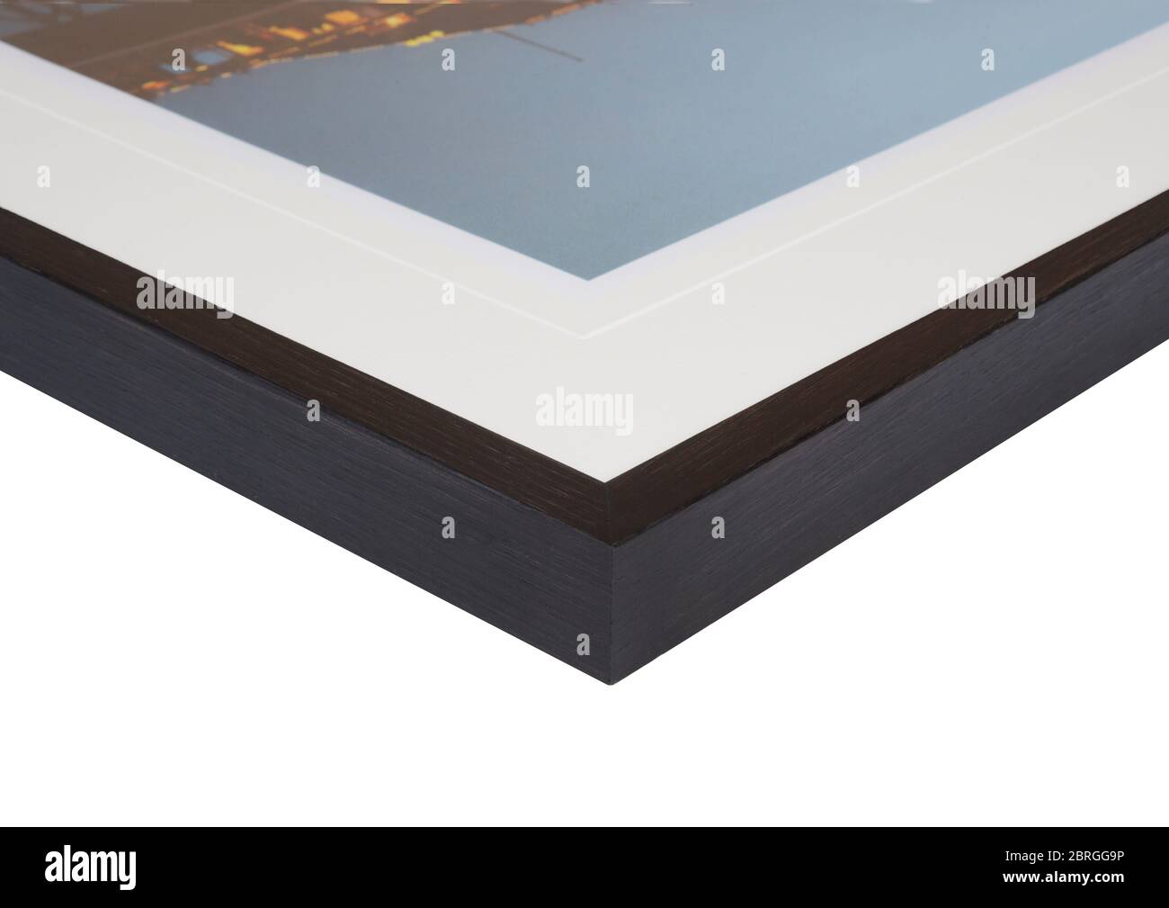 The corner and edge of a high quality wood photo frame complete with ...