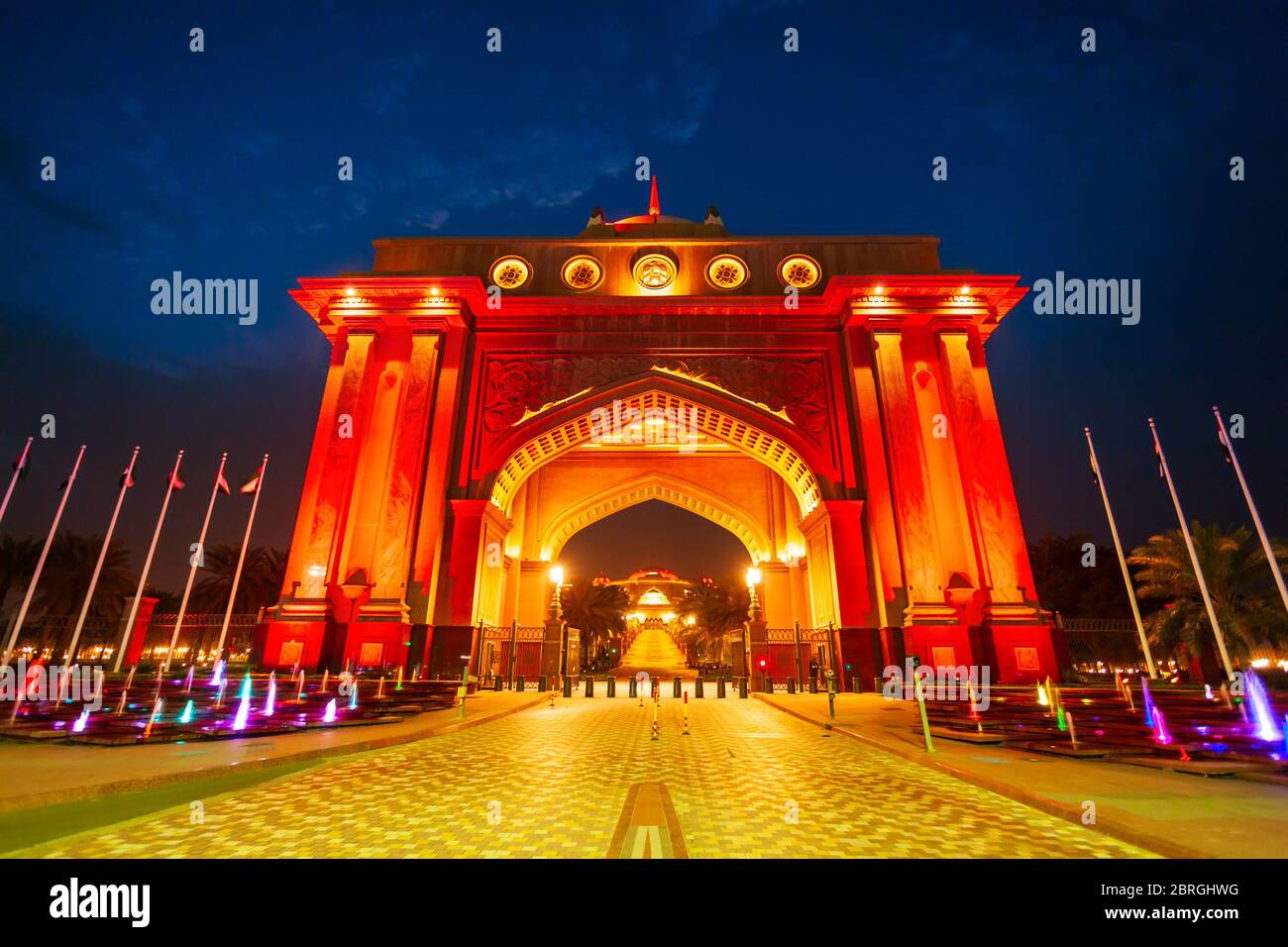 Abu Dhabi city gate at sunset. Abu Dhabi is the capital and the second ...