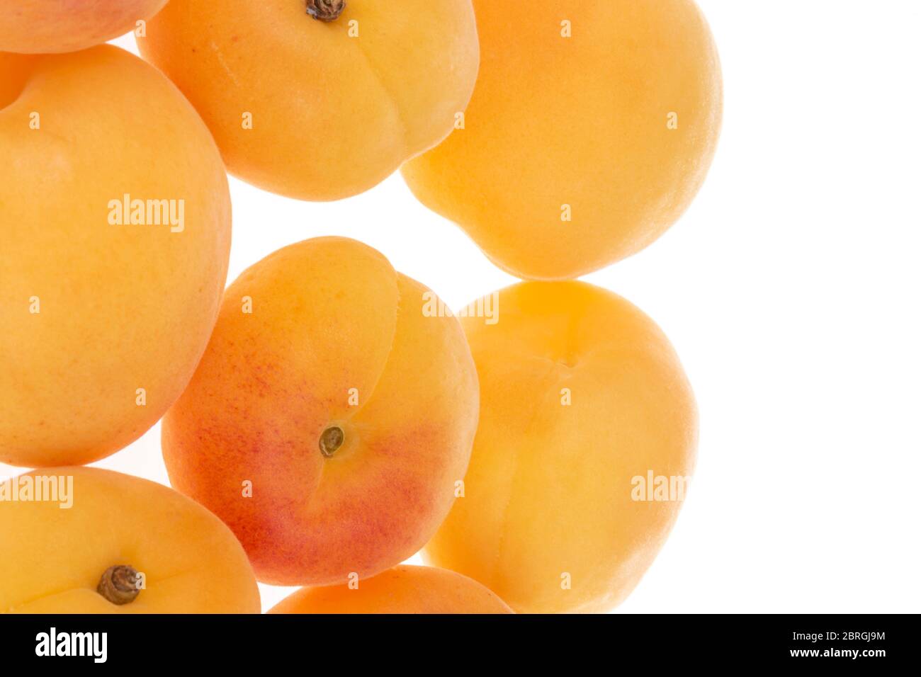 closeup fresh and ripe apricot fruits isolated on white Stock Photo - Alamy